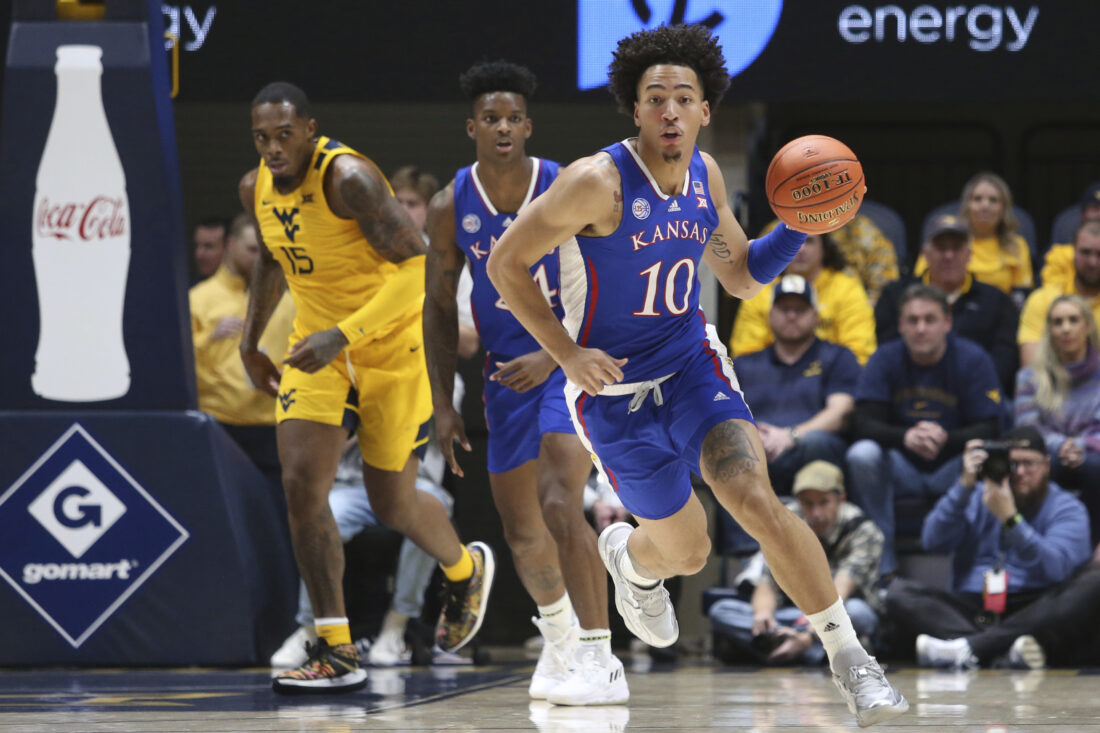Cool under fire: 3rd-ranked Kansas runs past West Virginia, 76-62, in ...